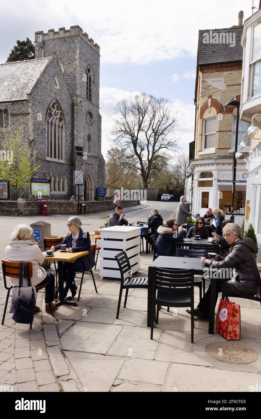 Cafe UK; People sitting drinking outside at a cafe in spring, Newmarket ...