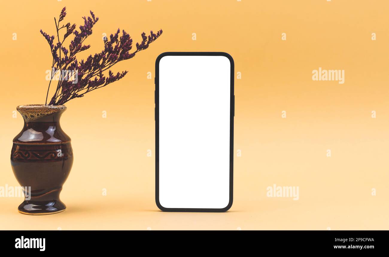Vintage and retro smartphone blank white screen mockup, photo still ...