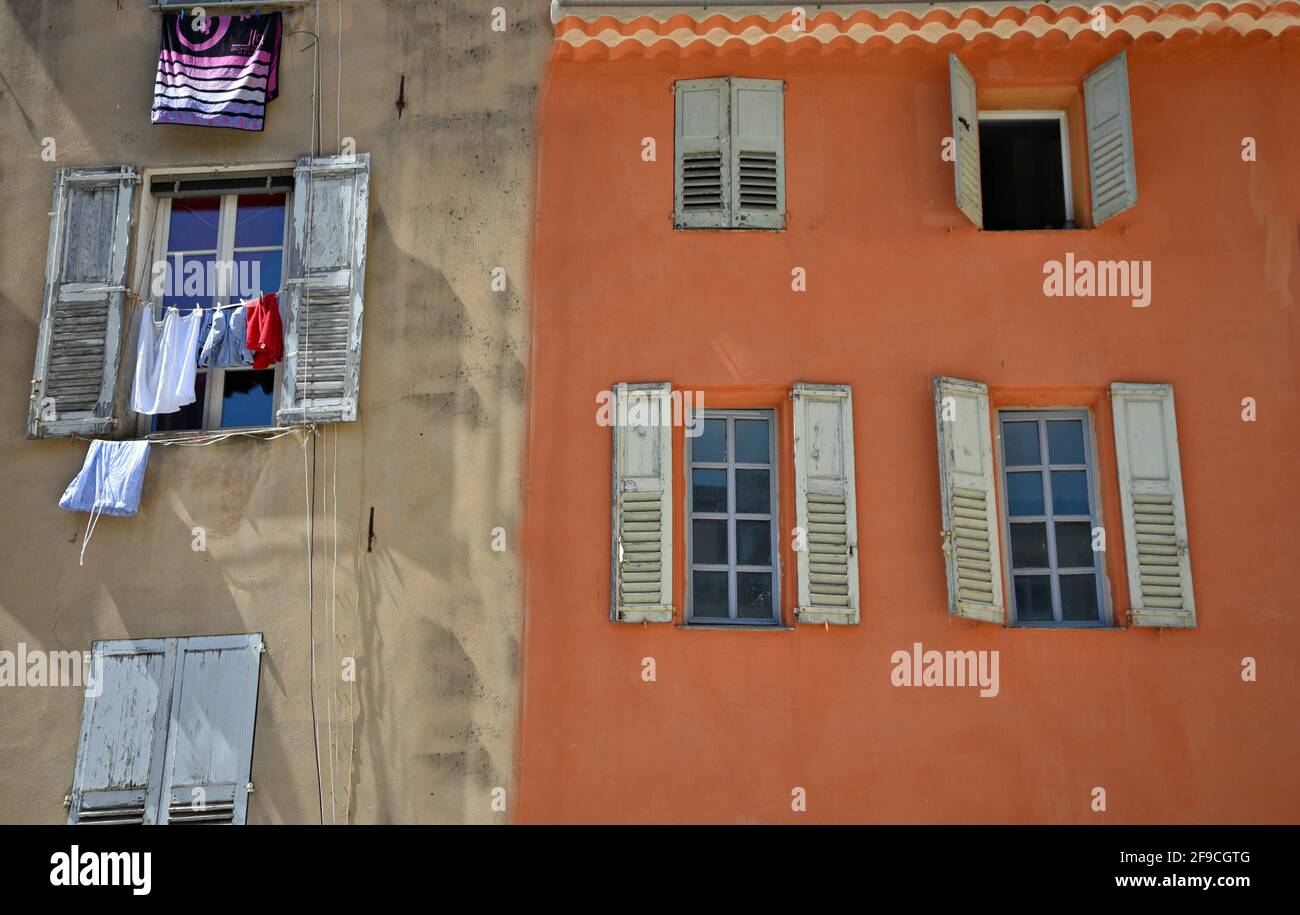 Old Provençal house facade with a Venetian stucco wall and wooden ...