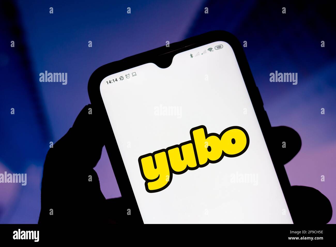In this photo illustration the Yubo logo seen displayed on a smartphone screen Stock Photo - Alamy