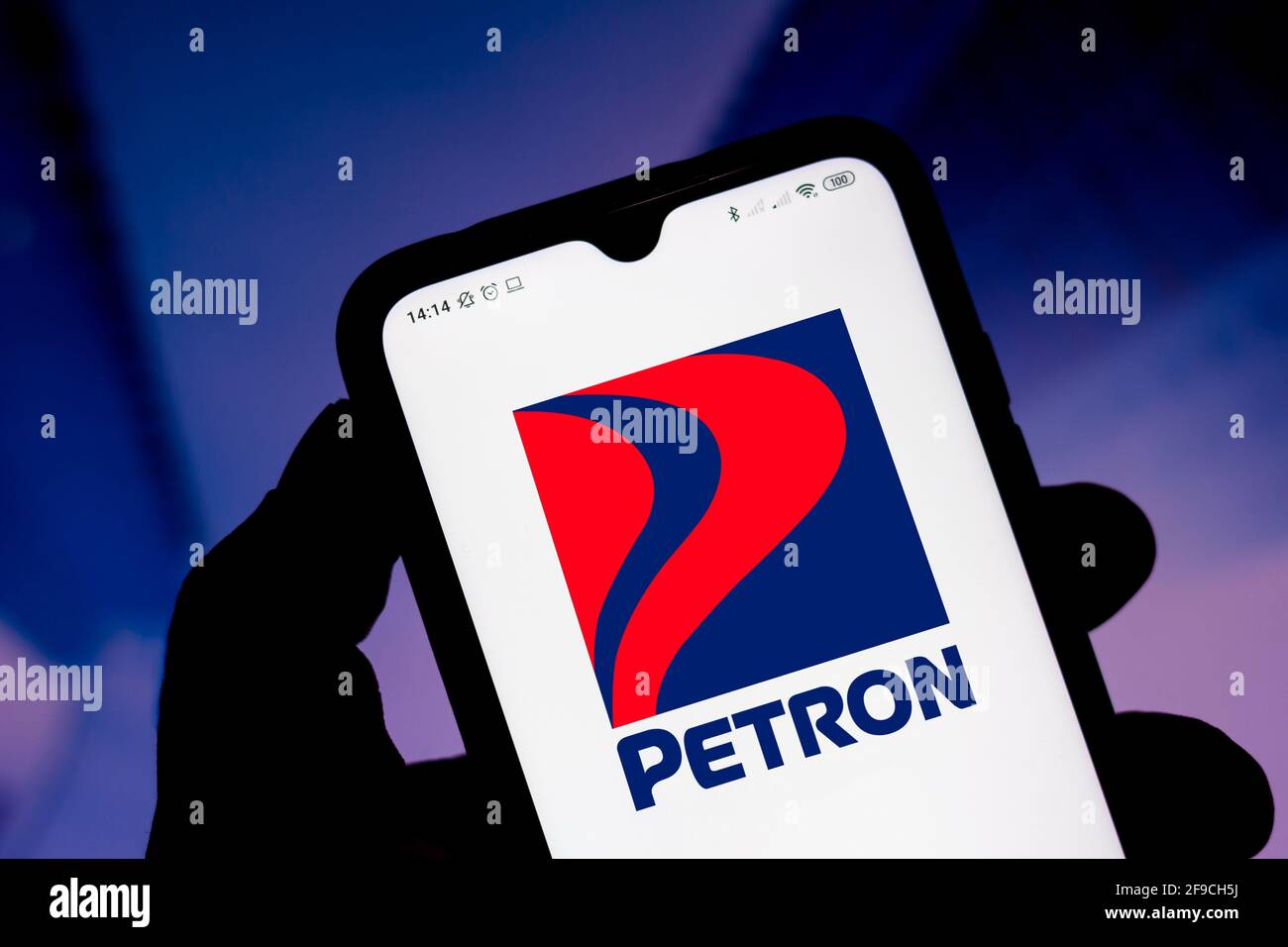In this photo illustration the Petron Corporation logo seen displayed ...