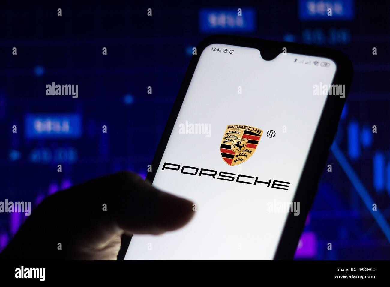 In this photo illustration the Porsche AG logo seen displayed on a ...