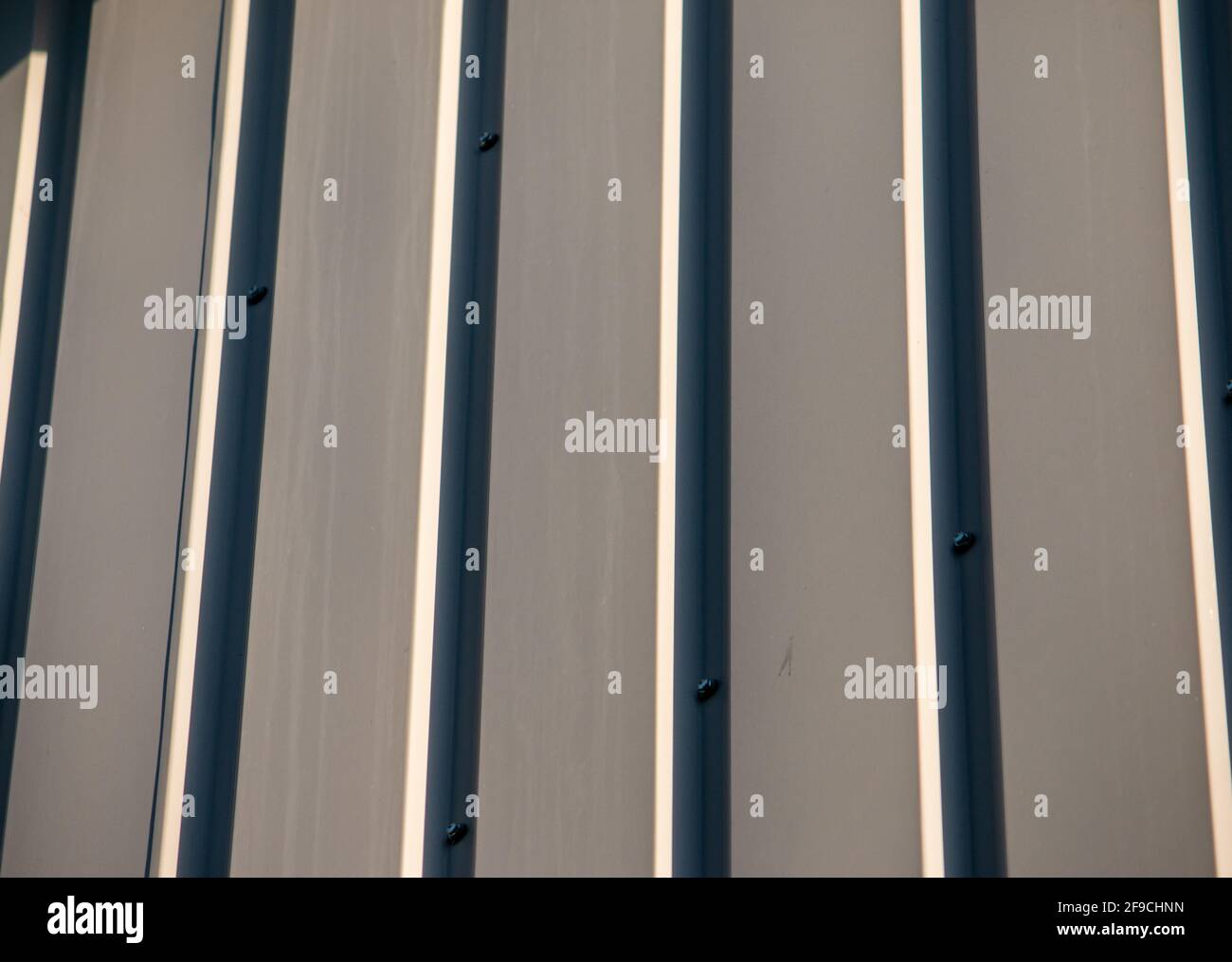 Perspective striped wall made of metal surfaces Stock Photo - Alamy