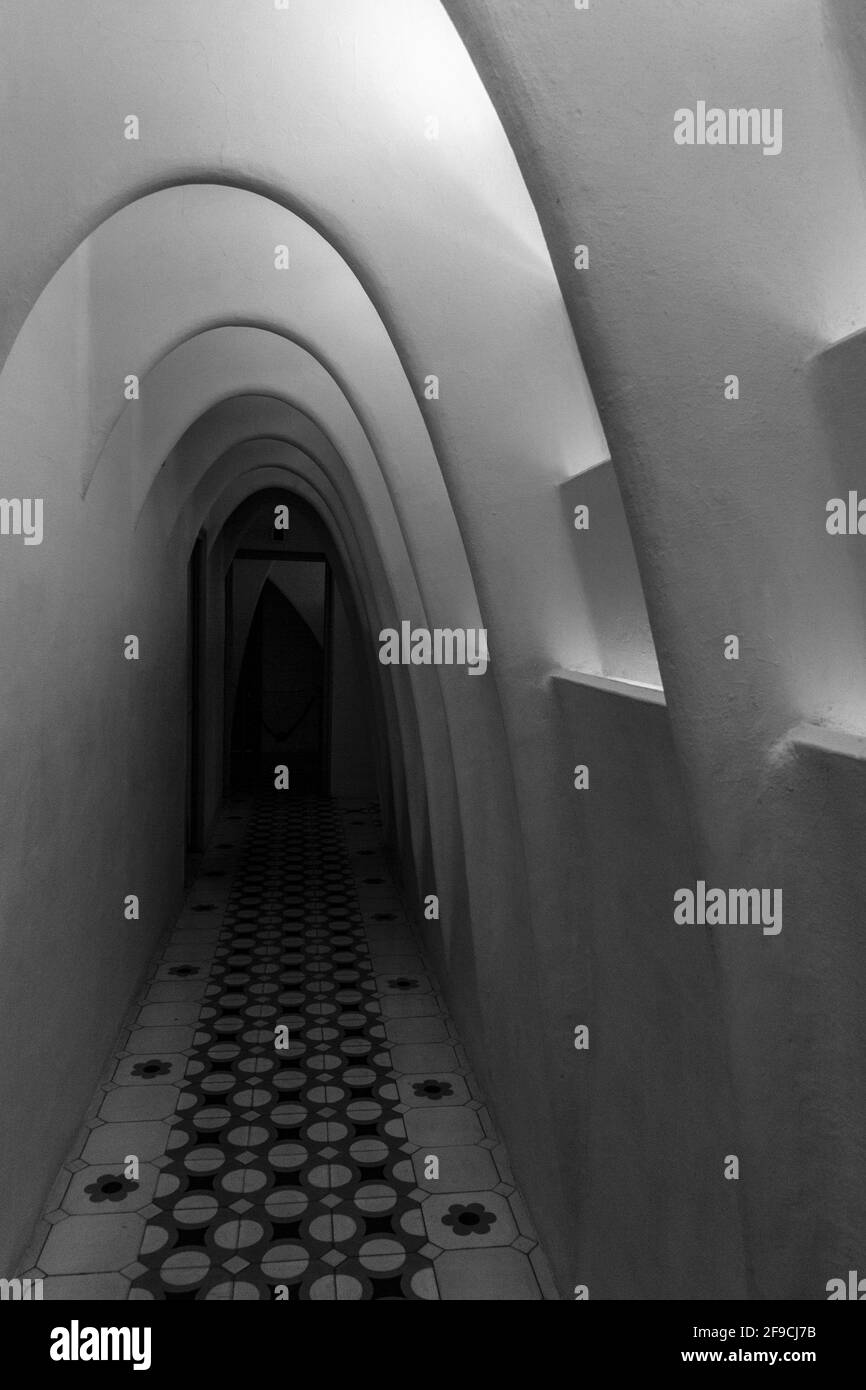 Vertical grayscale shot of an archway path in the building Stock Photo ...