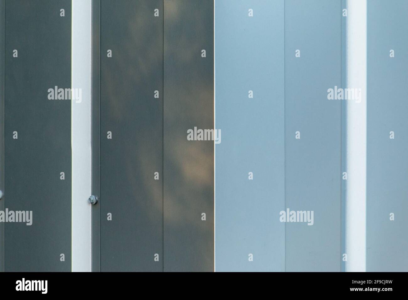 corner of shiny metal building wall paneling Stock Photo - Alamy