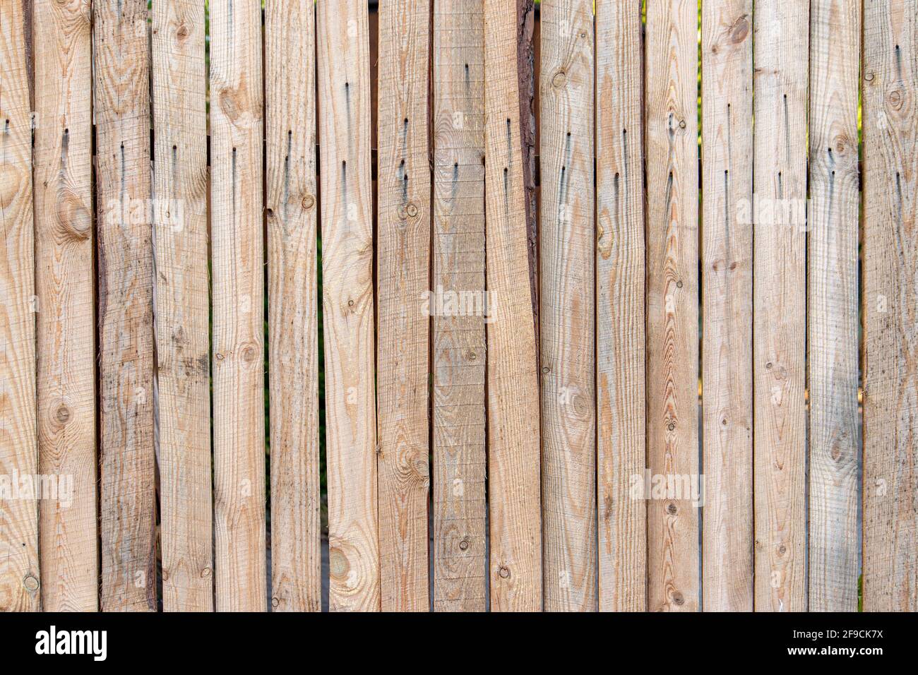 Wooden fence of waste boards Stock Photo - Alamy