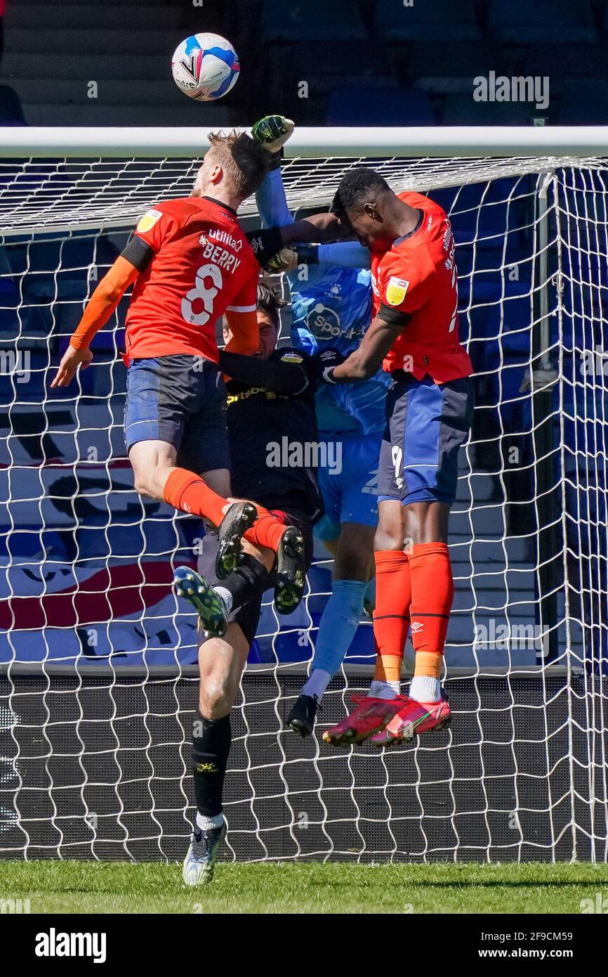 Luton, UK. 17th Apr, 2021. Luke Berry #8 of Luton Town battles with ...