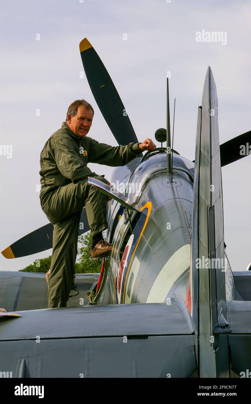 Pilot Nigel Lamb preparing for flight in Second World War fighter plane ...