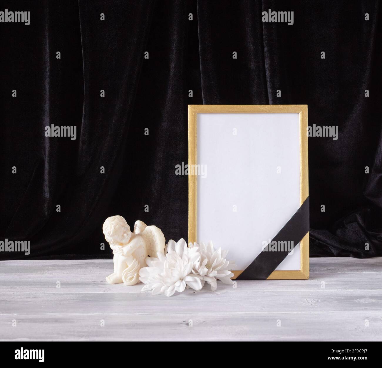 The concept of memory, funerals and condolences. Photo frame with black ...