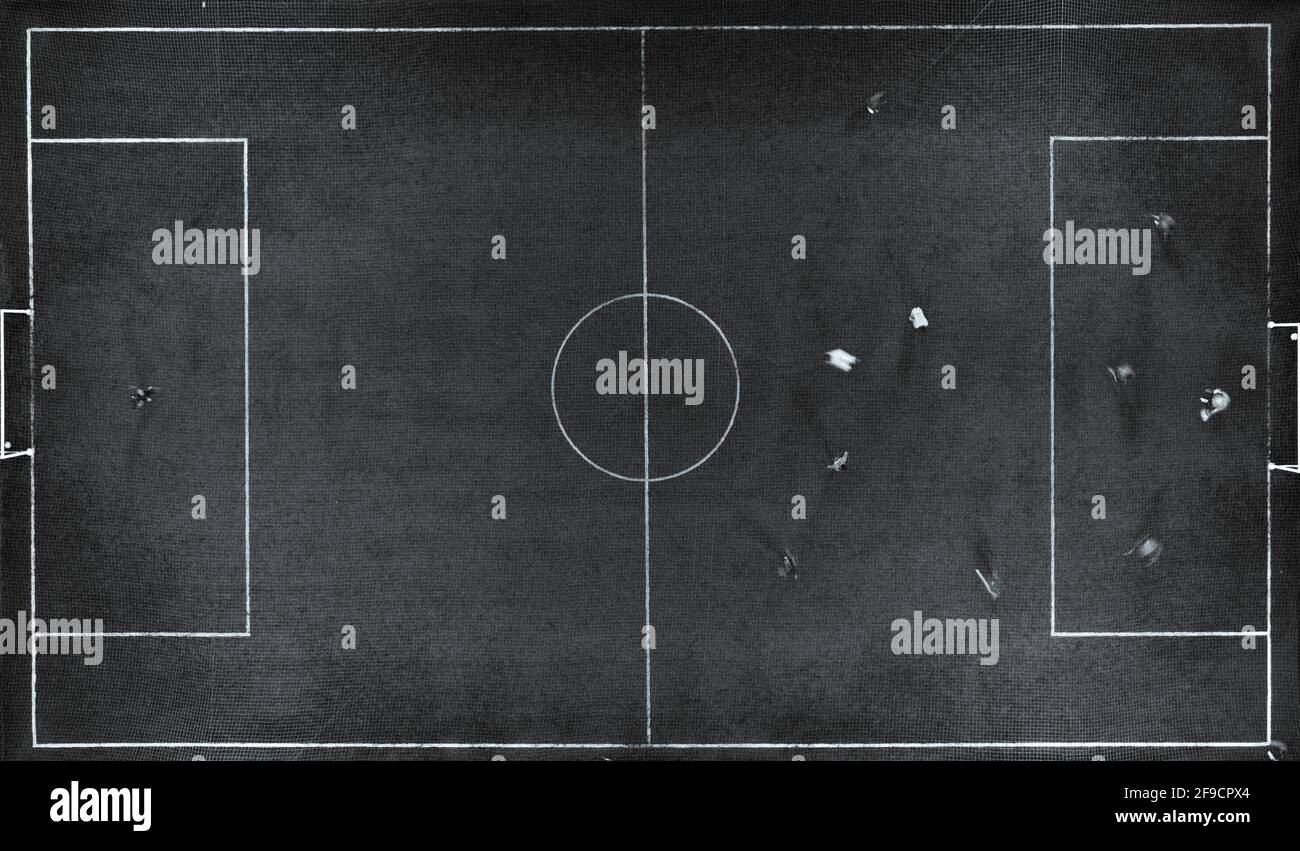 Aerial view of players playing football on the football field Stock ...