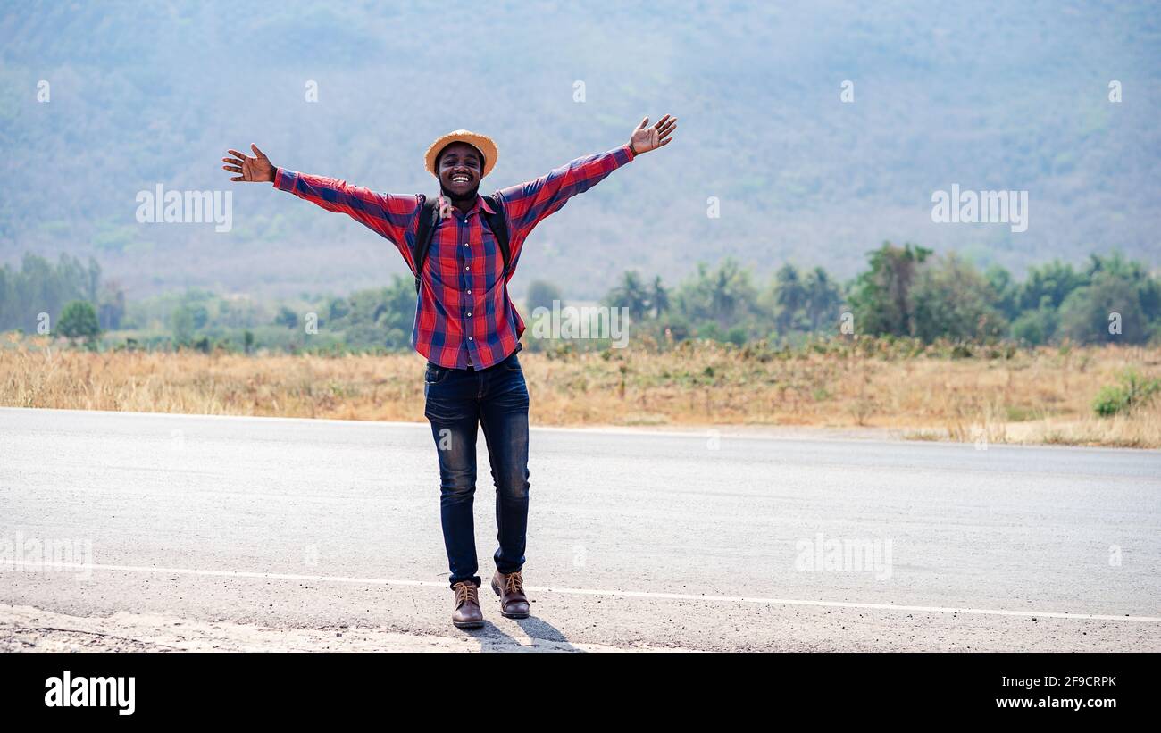 Man walking on mountain highway hi-res stock photography and images - Alamy