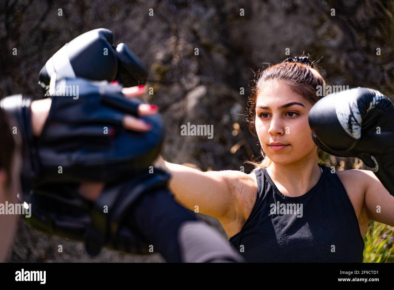 Pretty young Italian girl practices boxing Stock Photo - Alamy