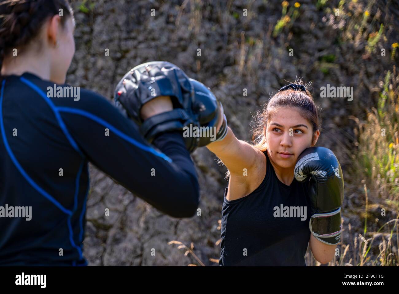 Pretty young Italian girl practices boxing Stock Photo - Alamy
