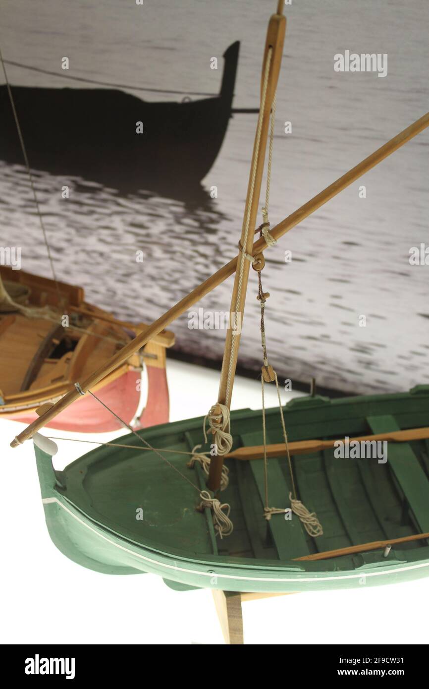 Traditional Mediterranean fishing barque skiff boat with lateen sail ...