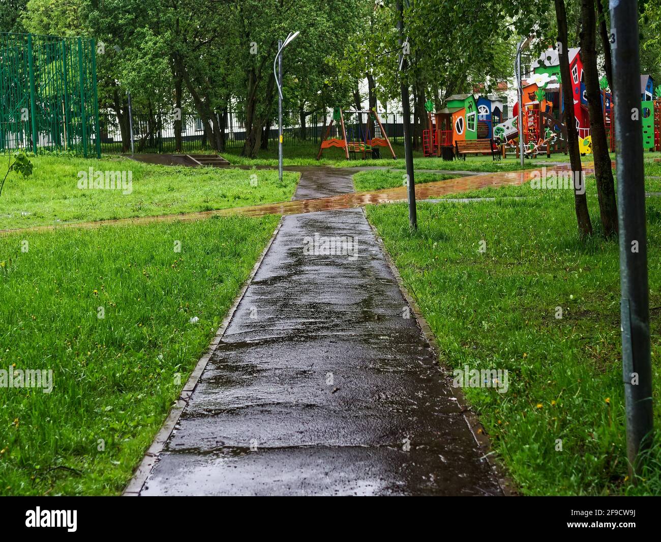 Sidewalk park rain puddle asphalt hi-res stock photography and images ...