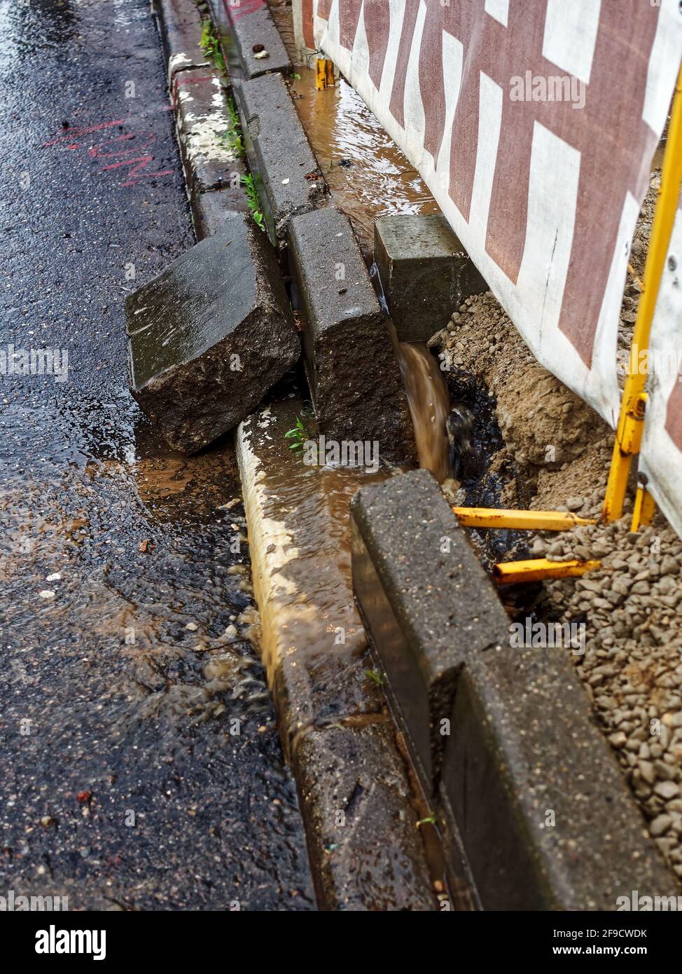 streams of water on the road and tratoire, in summer Stock Photo - Alamy