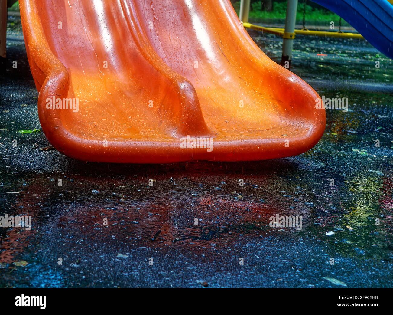Playground after heavy rain in summer Stock Photo - Alamy