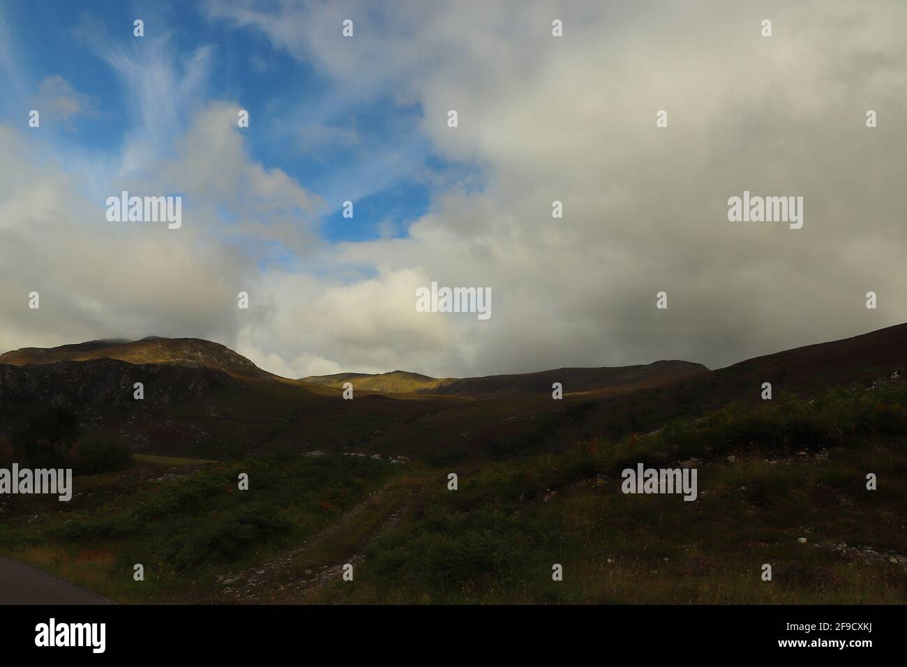 Path winding down hill hi-res stock photography and images - Alamy