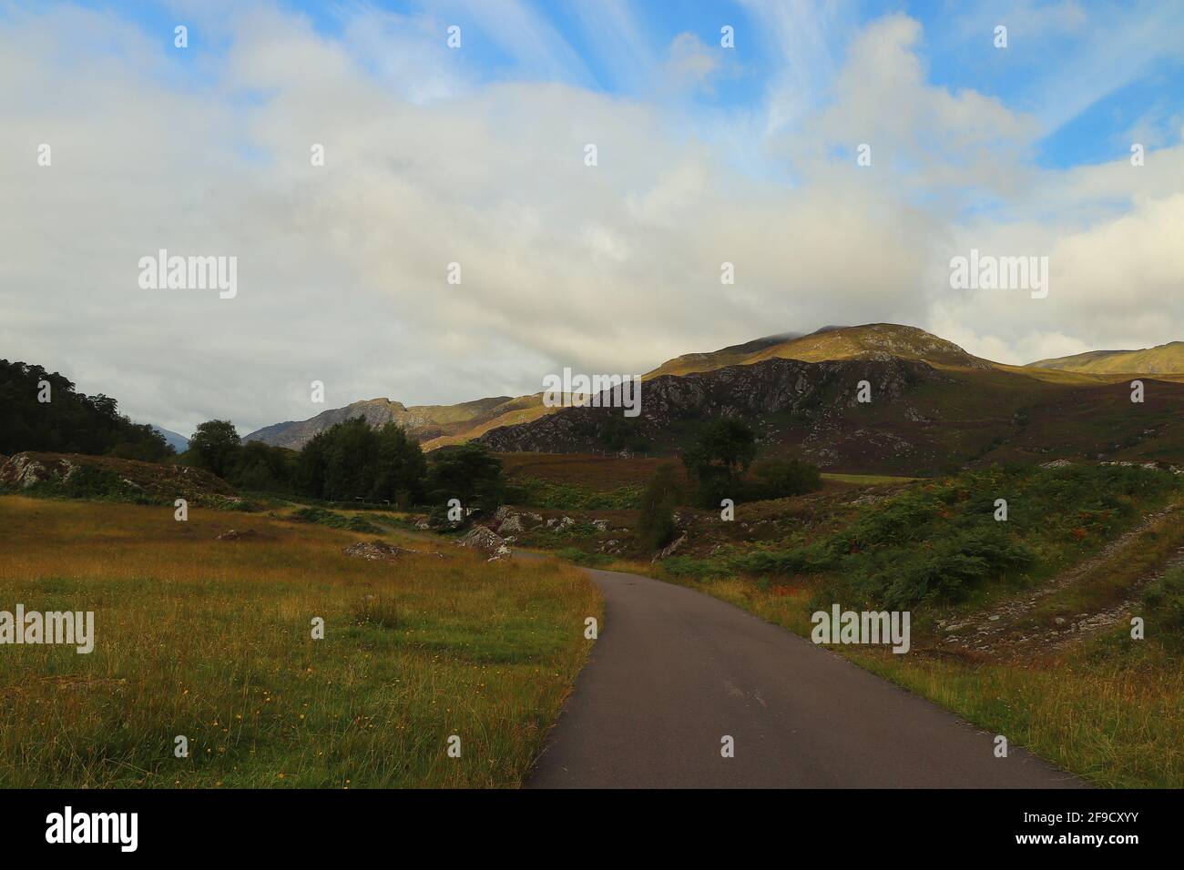 Path winding down hill hi-res stock photography and images - Alamy