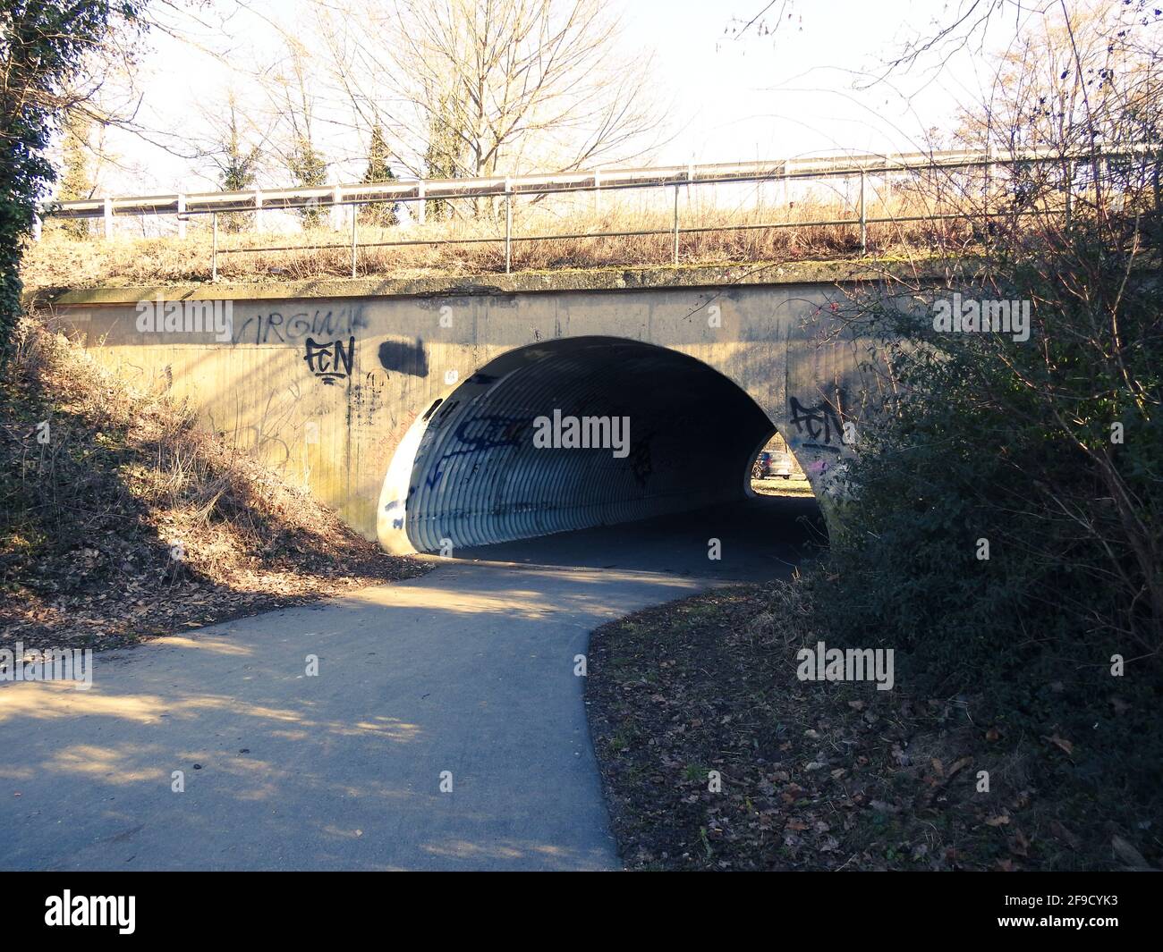 Pedestrian underpass under a bridge Stock Photo - Alamy