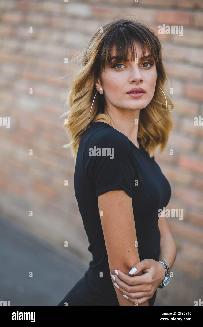 Beautiful Bosnian lady with expressive eyes wearing a black t-shirt ...