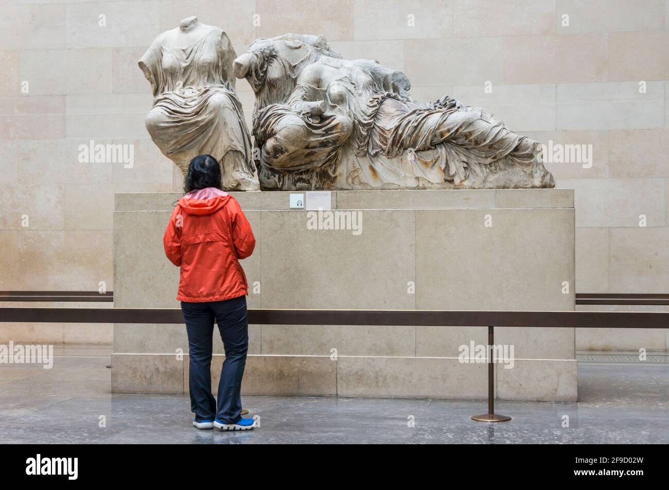 Elgin Marbles. Visitor & sculpture of three goddesses from east ...