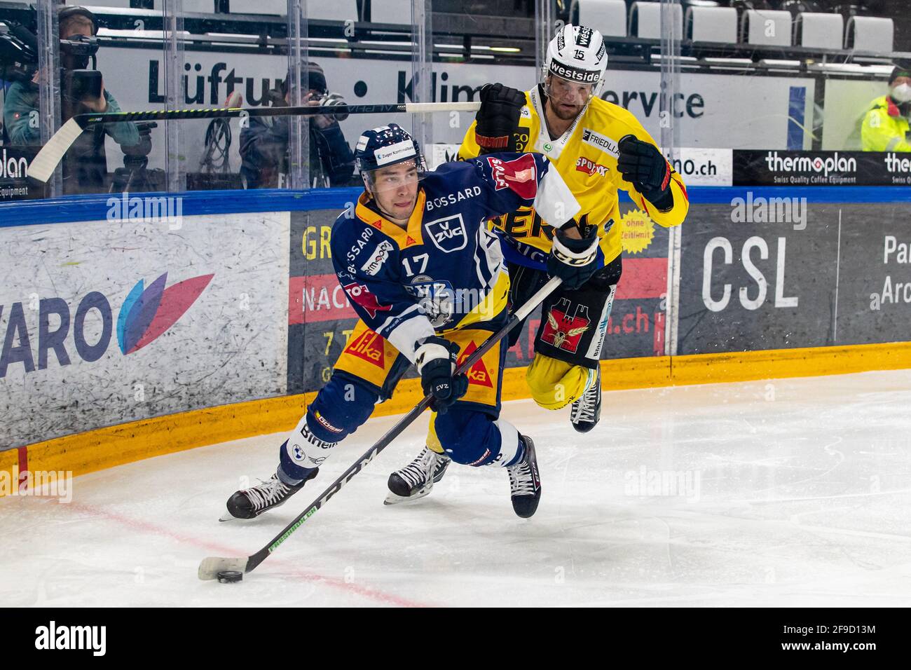 # 15 Dustin Jeffrey (Bern) against Livio Langenegger # 17 (EV Zug ...