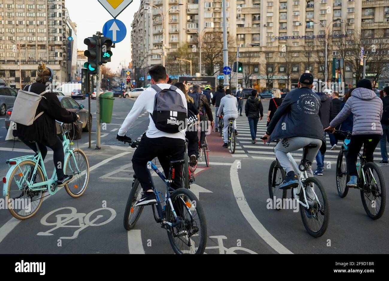 Bucharest, Romania - April 01, 2021: People on bicycles are waiting to ...
