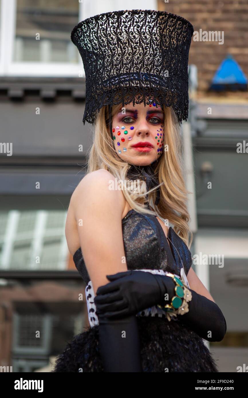 A model showcases Pierre Garroudi's latest colorful collection at one ...