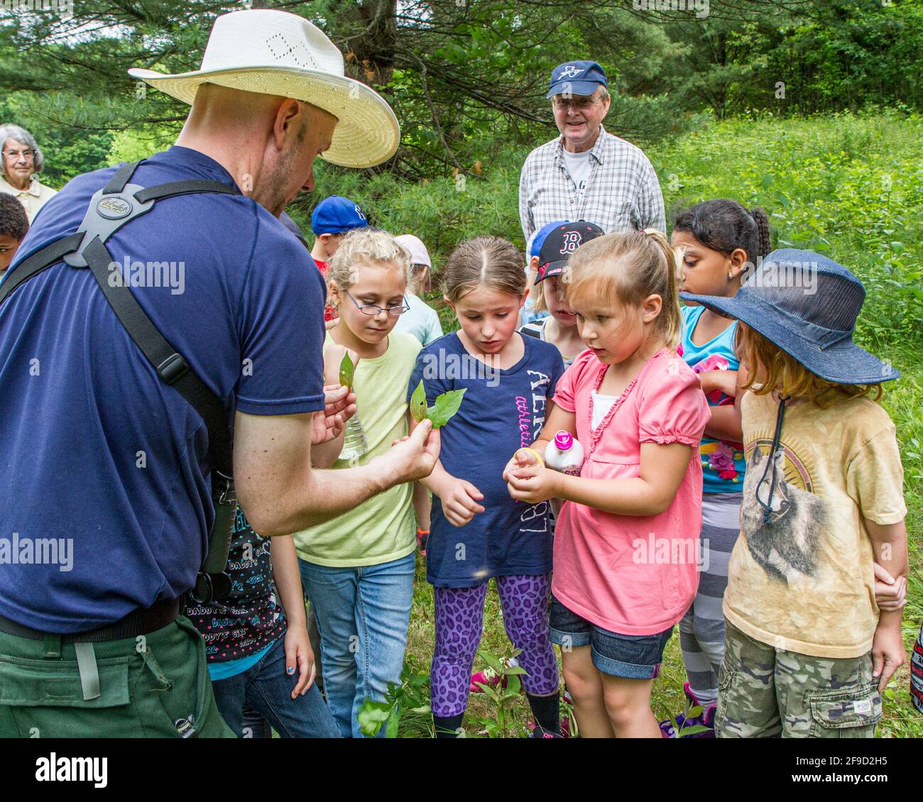 Children learning about nature with a trained naturalist Stock Photo ...