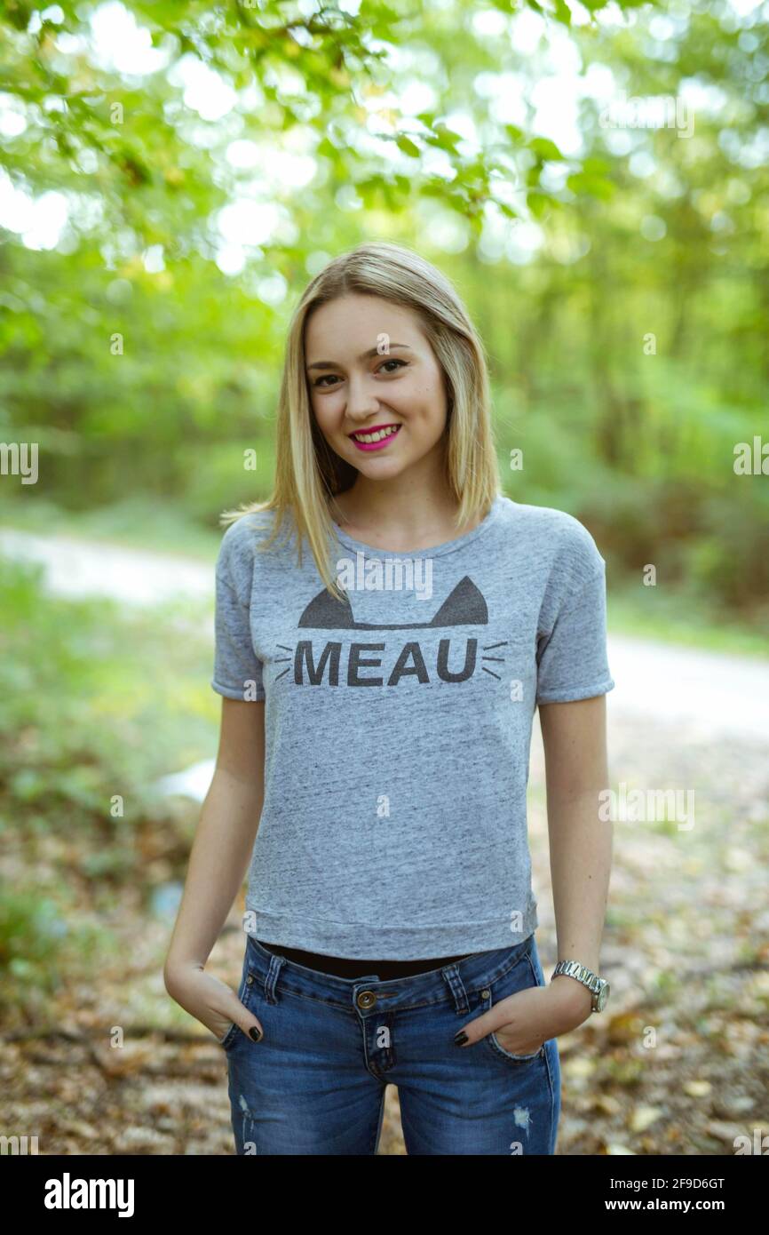 Happy blond hair Caucasian female from Bosnia and Herzegovina posing in ...