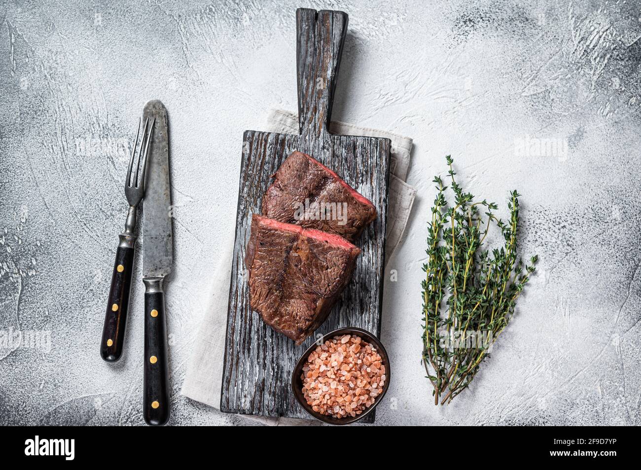 Roasted Shoulder Top Blade or flat iron beef meat steaks on wooden ...