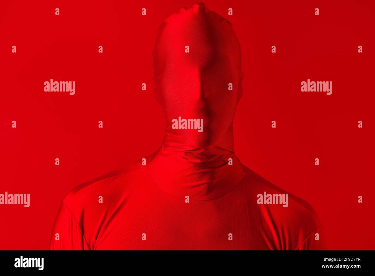 Crazy red man on a red background. figure in a leotard covering the ...