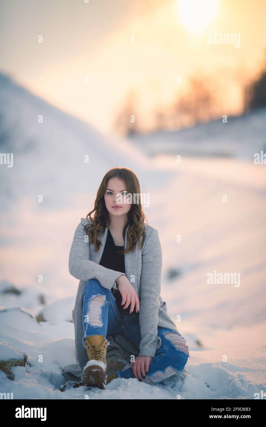 Fashionable Bosnian Caucasian woman looking at the camera with a ...
