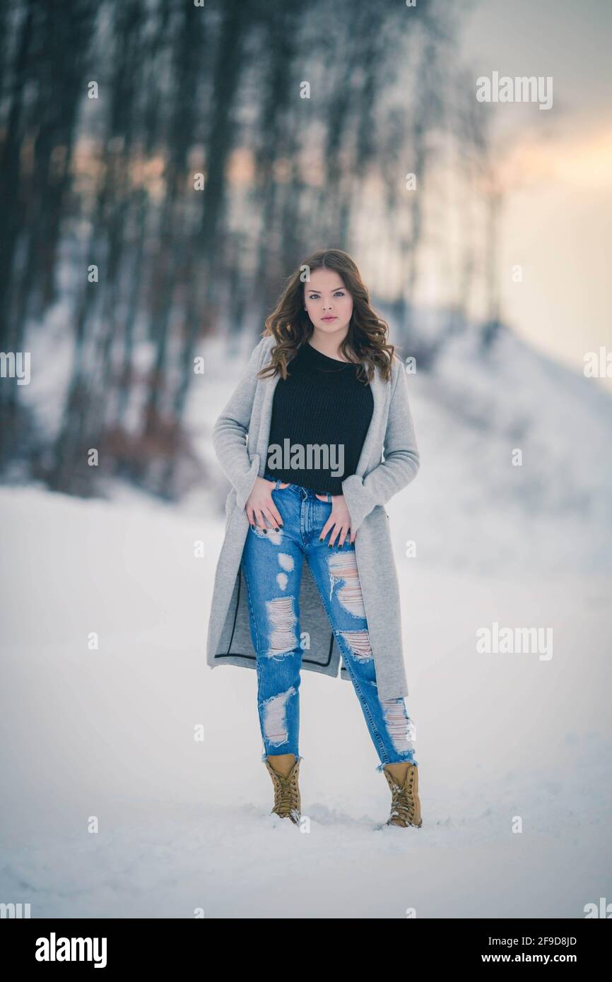 Fashionable Bosnian Caucasian woman looking at the camera with a ...