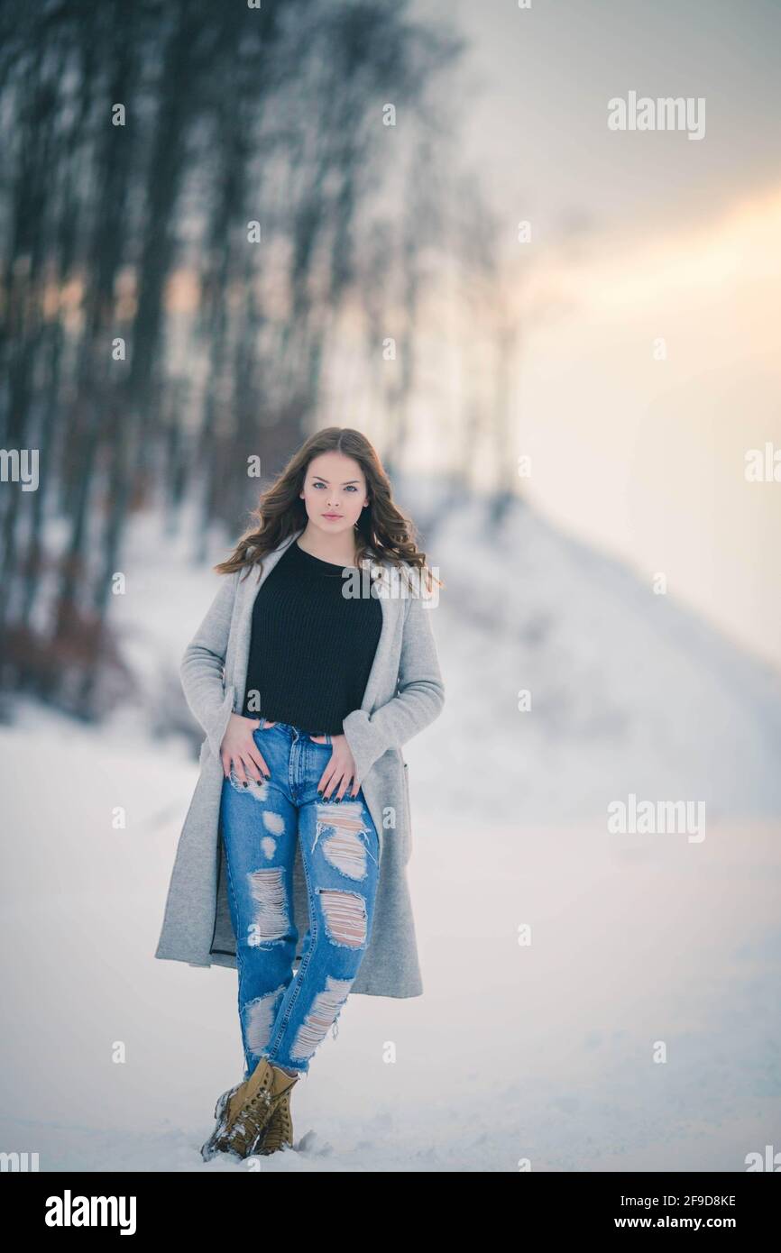 Fashionable Bosnian Caucasian woman looking at the camera with a ...