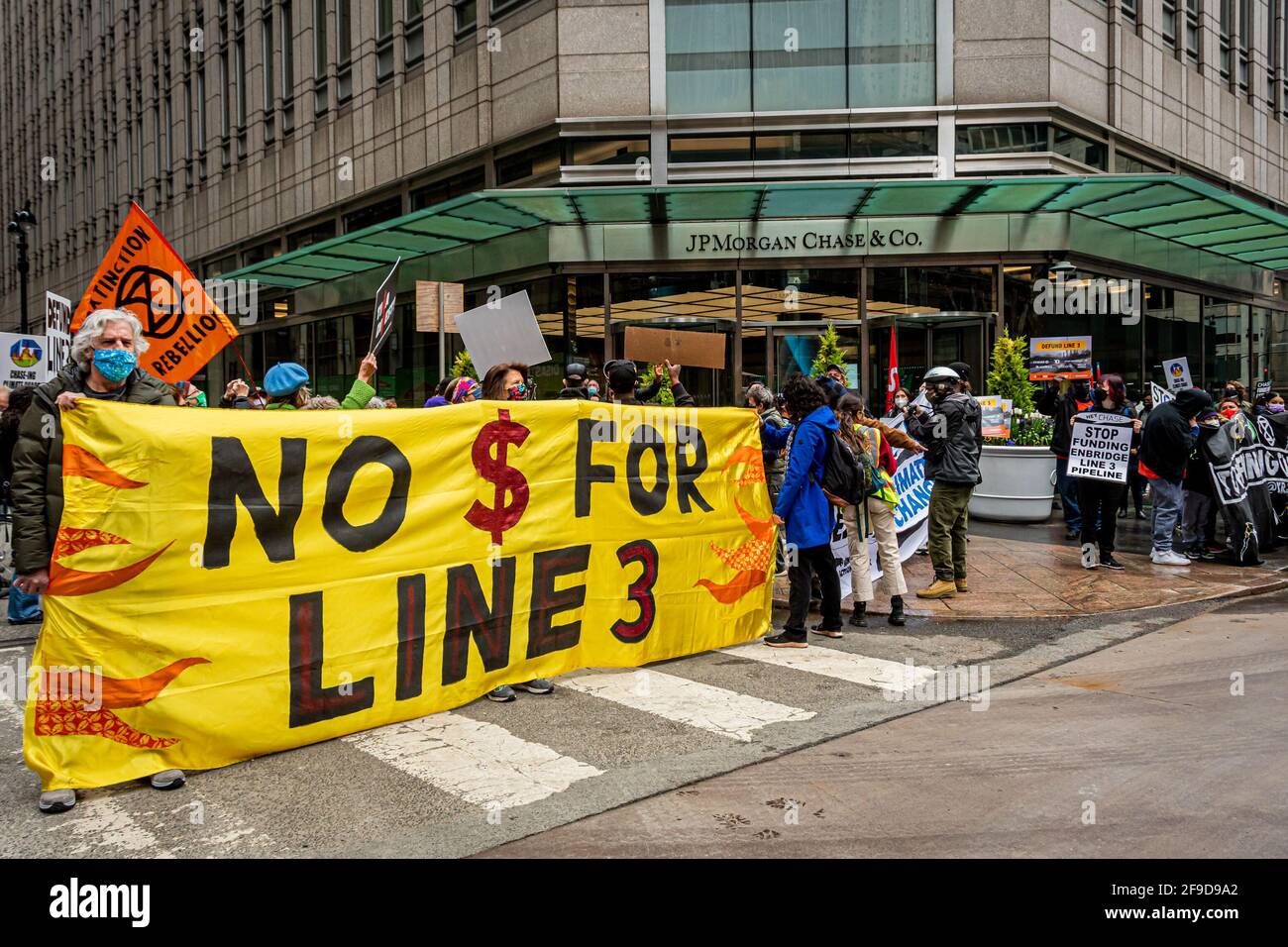 Climate activists with Stop the Money Pipeline held a rally in midtown ...