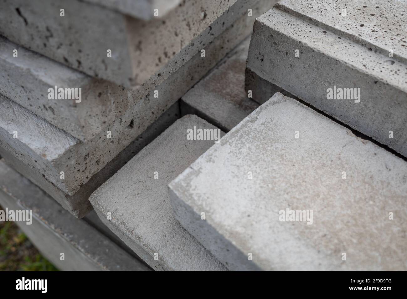 Selective focus, stack of concrete blocks. Building material cement ...