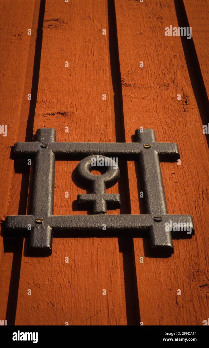 The chemical sign for copper on a house in the city of Falun painted in ...