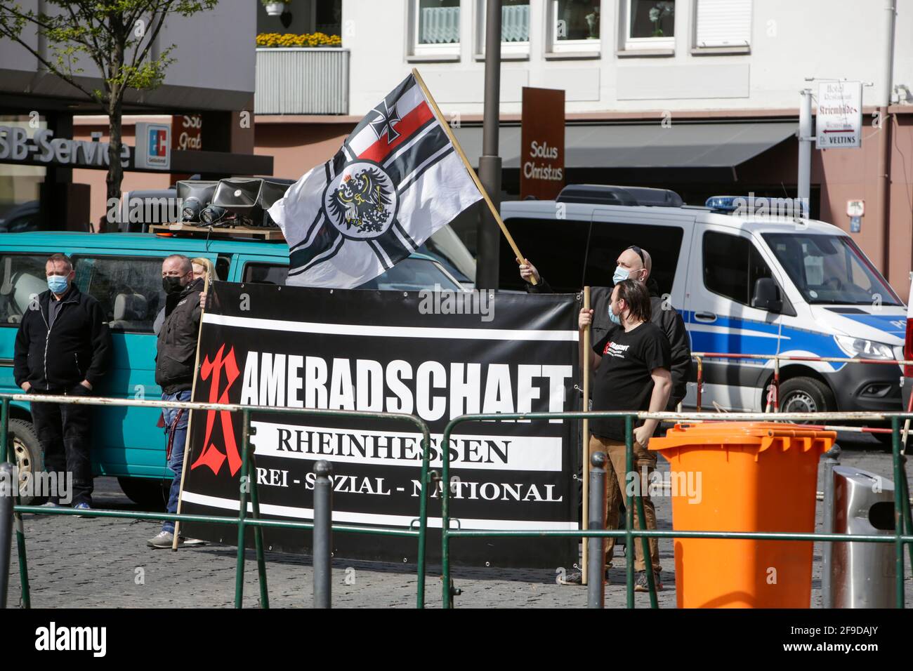 Right-wing demonstrators protest with banners and flags. Around 10 ...