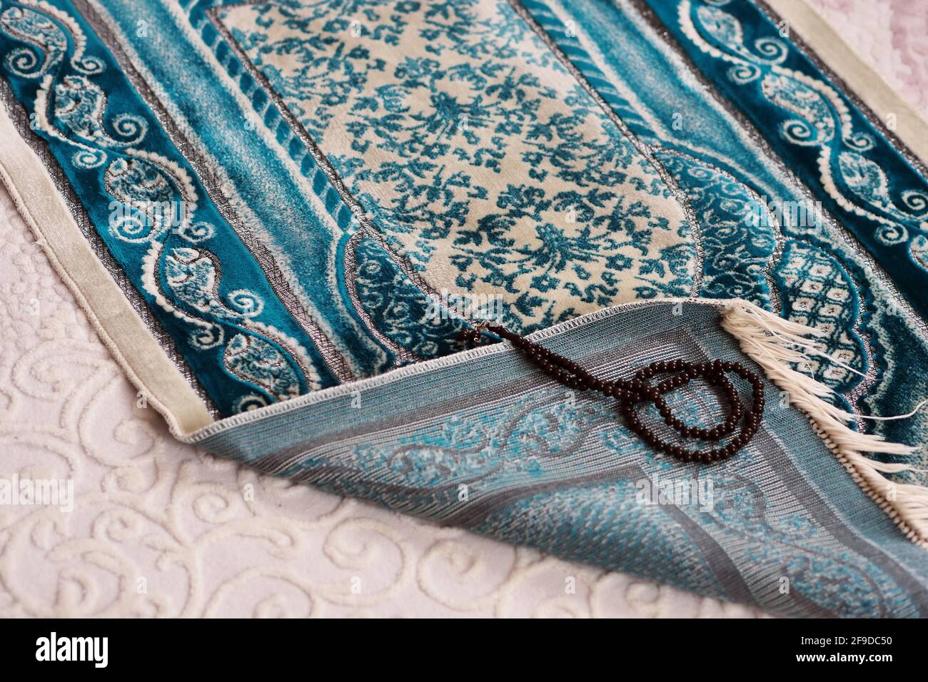praying in the month of Ramadan, prayer rugs laid on the ground, Islam ...