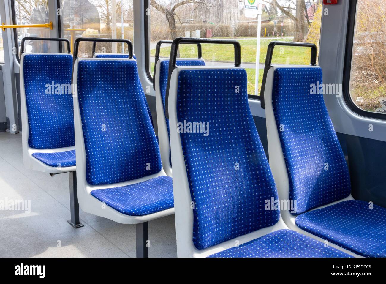 Blue seats in a tram Stock Photo - Alamy