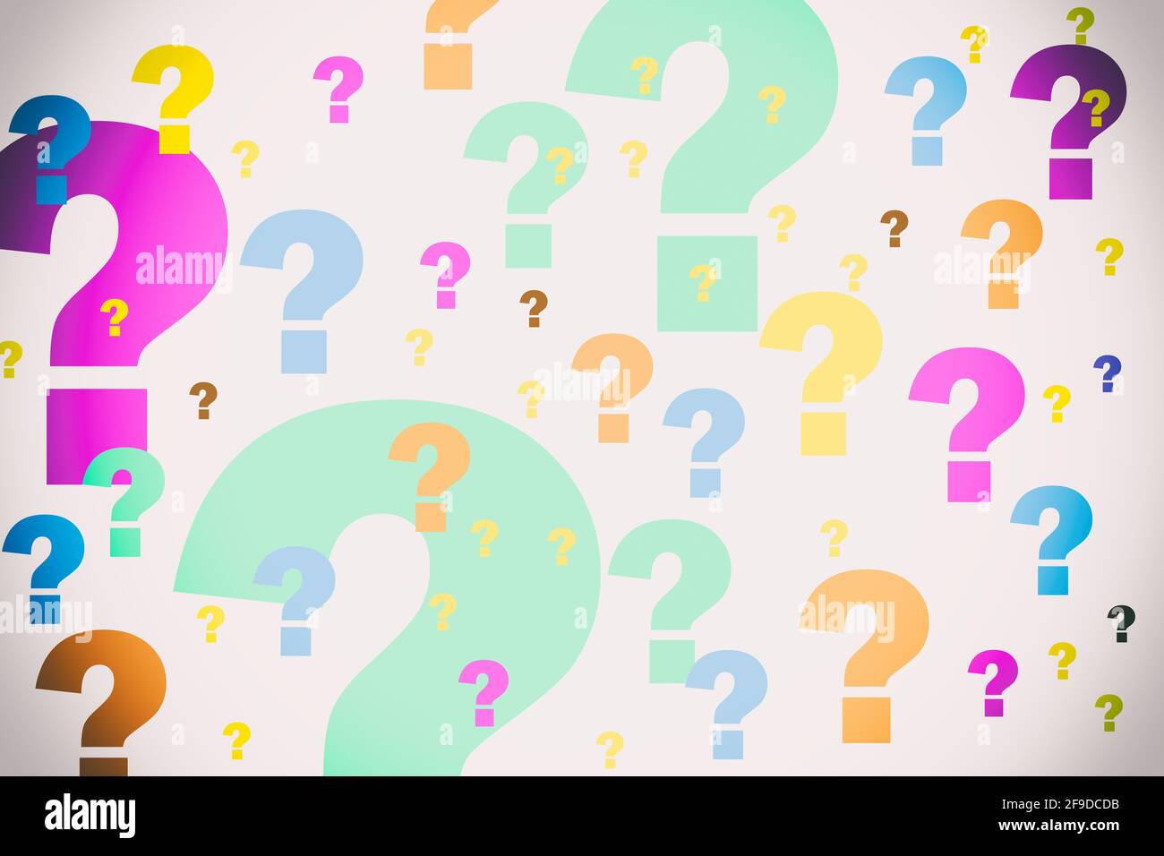 Many question marks of different sizes and colors on a white background ...