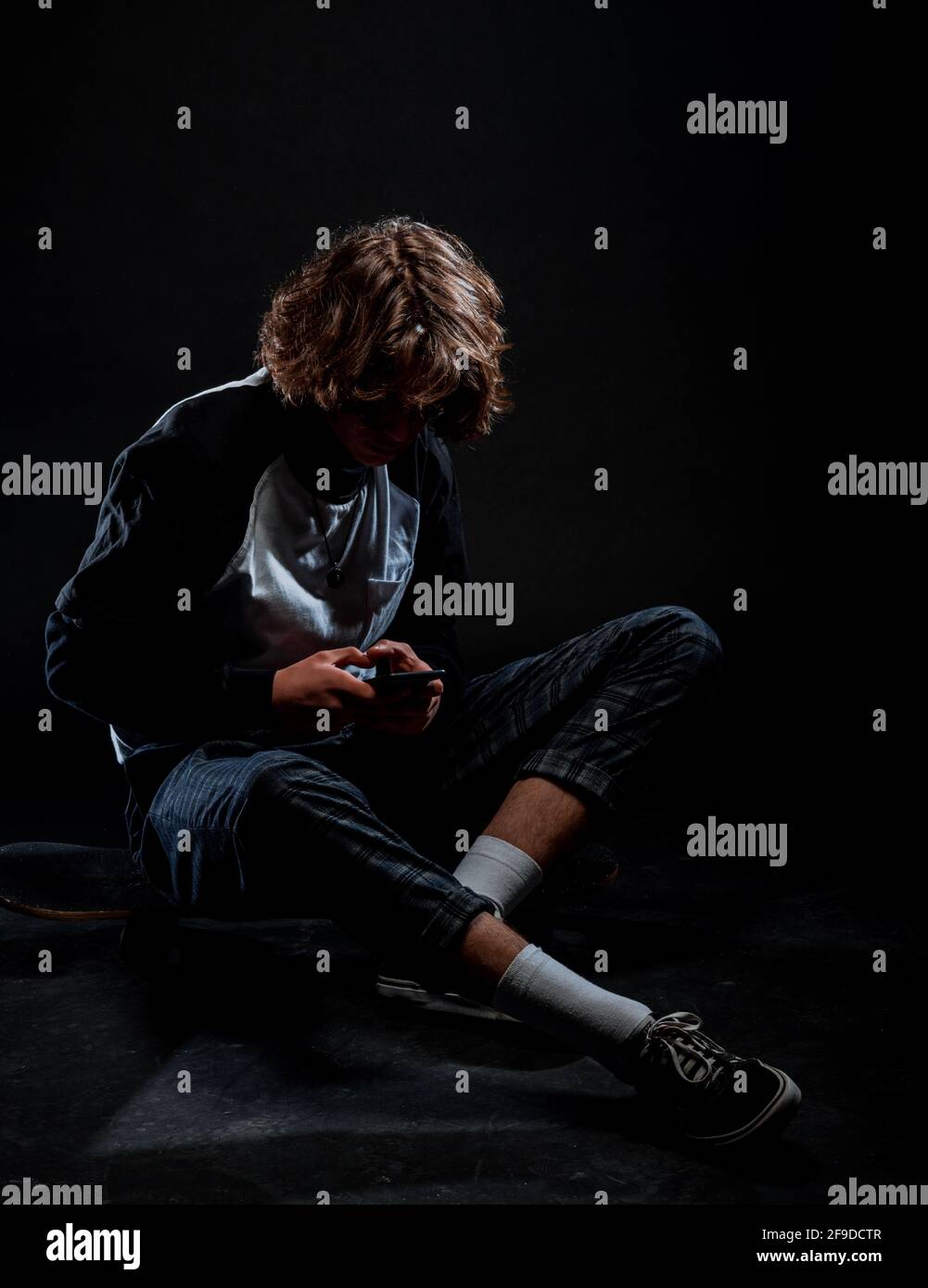 Studio body shot of a fashion male model wearing stylish clothes ...