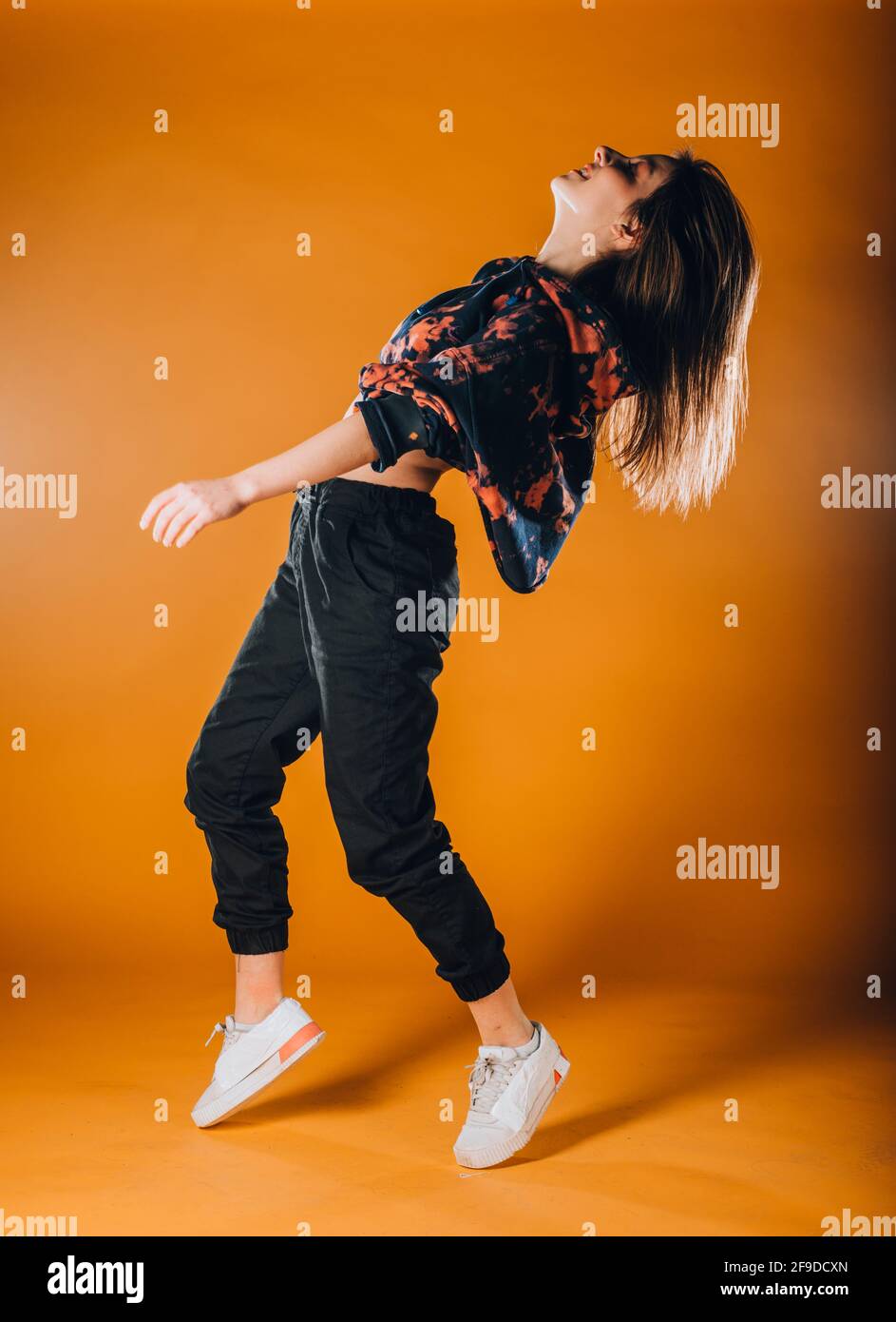 Young dance performer during a dance practice at the studio Stock Photo ...