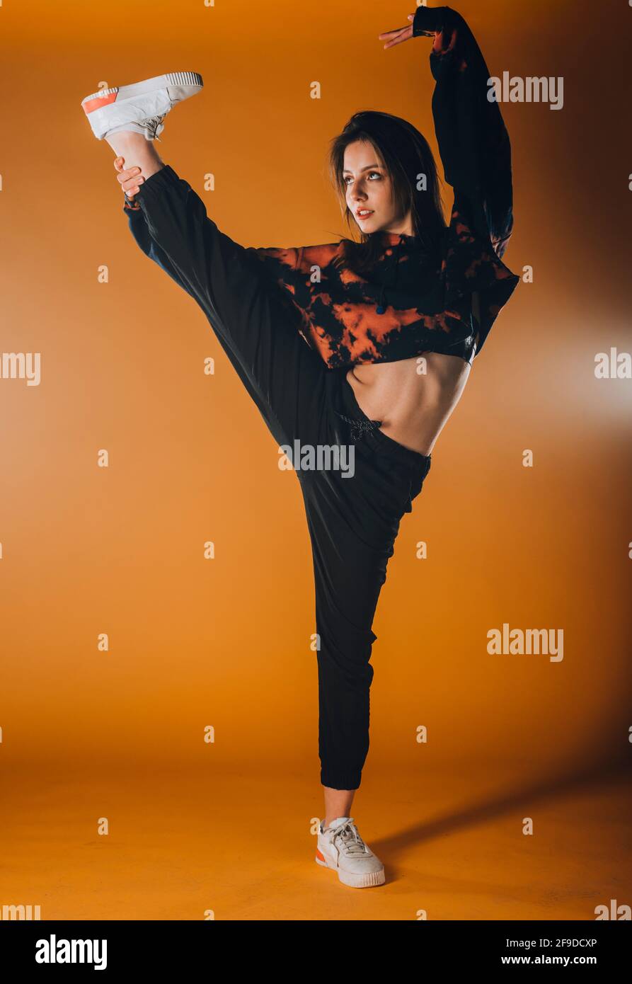 Beautiful girl performing a contemporary dance routine Stock Photo - Alamy