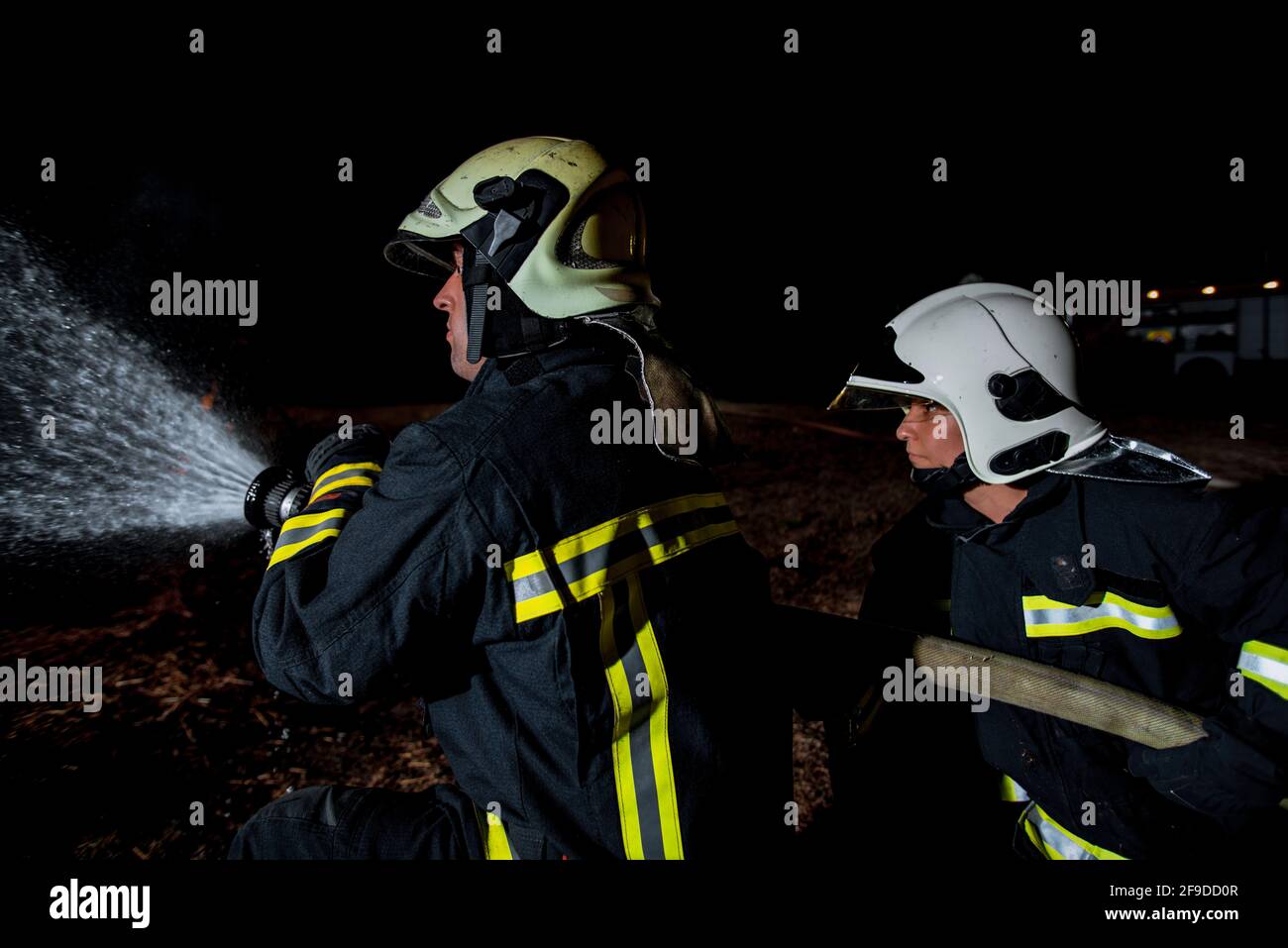Fire department in the field during a fire emergency situation Stock ...