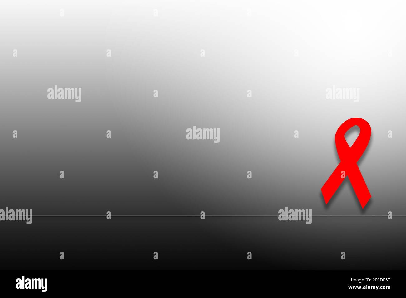 A gradient gray background with the red icon of the fight against AIDS ...