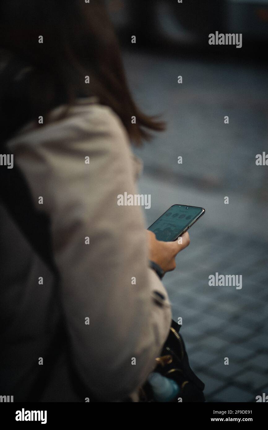 An unrecognizable woman scrolling through her Instagram feed Stock ...