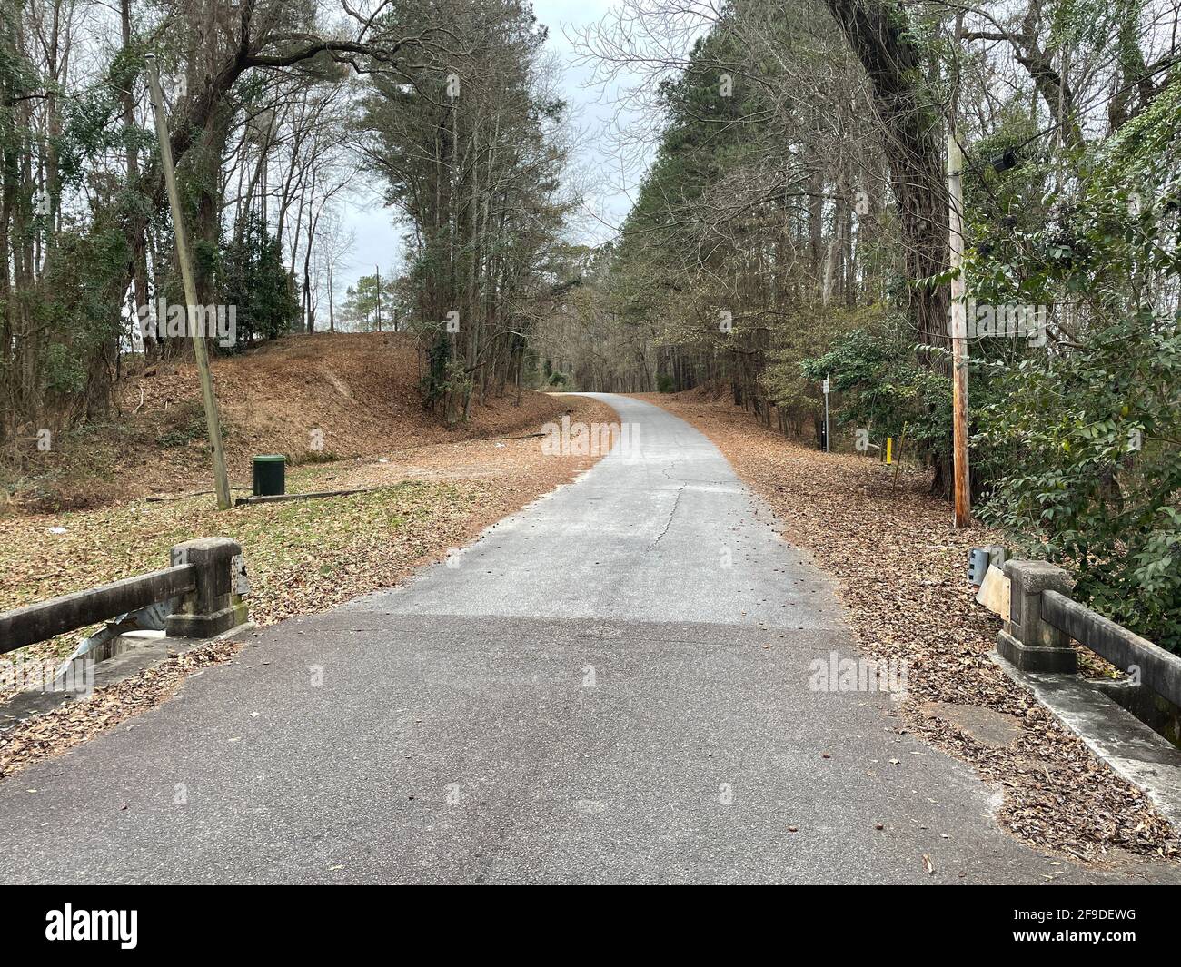 View an old gravel country road with a Concrete bridge in rural Georgia ...